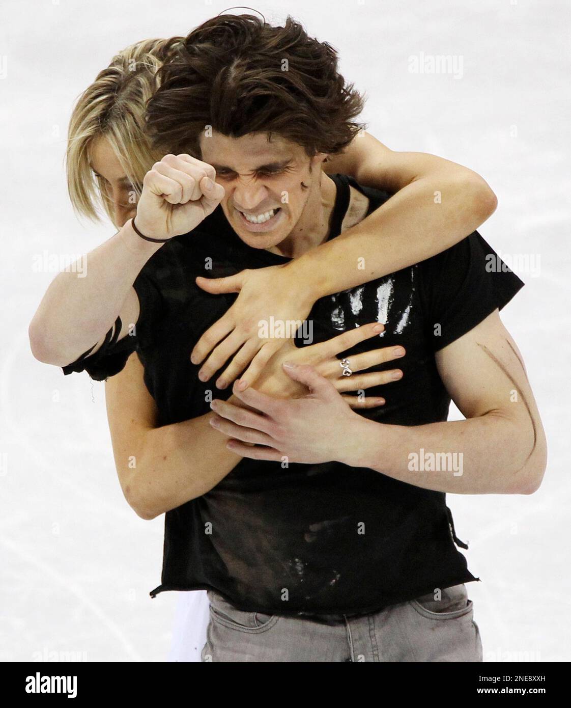Britain's Sinead Kerr and John Kerr perform their free dance during the ice dance figure skating ...