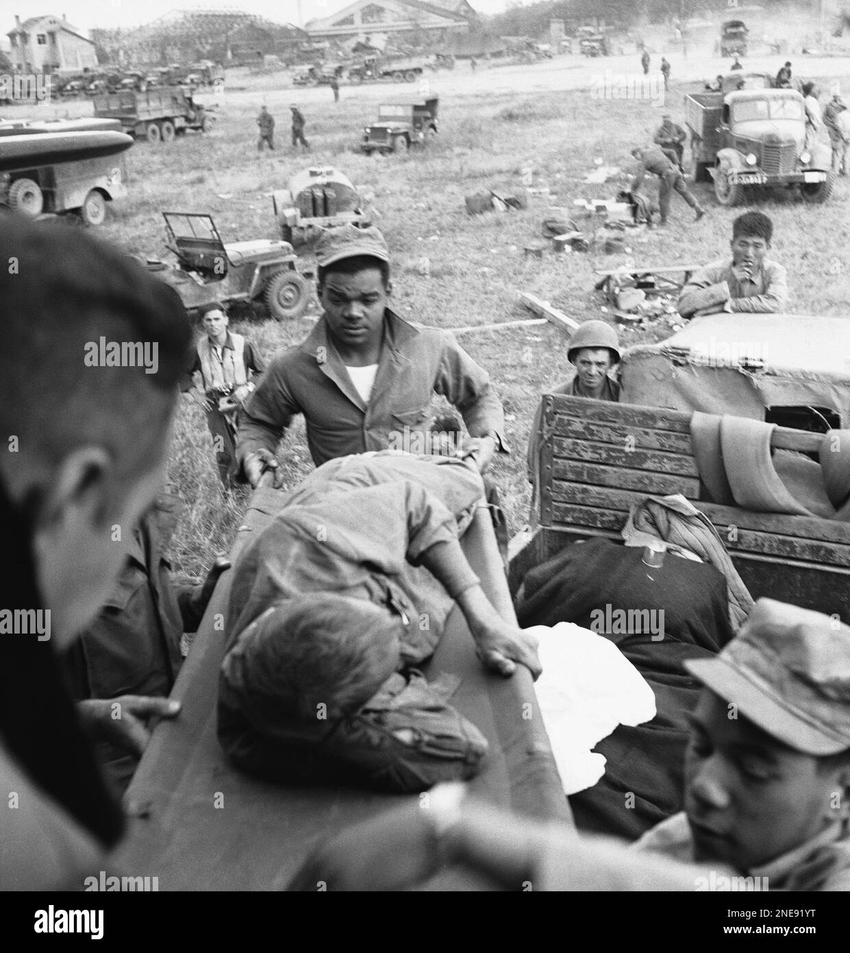 An unidentified American soldier, one of 21 who survived a massacre by ...