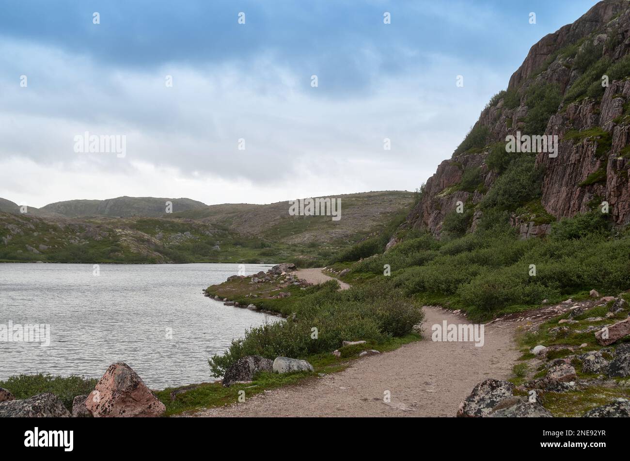 Summer landscape with lake, rocks and forest Stock Photo - Alamy