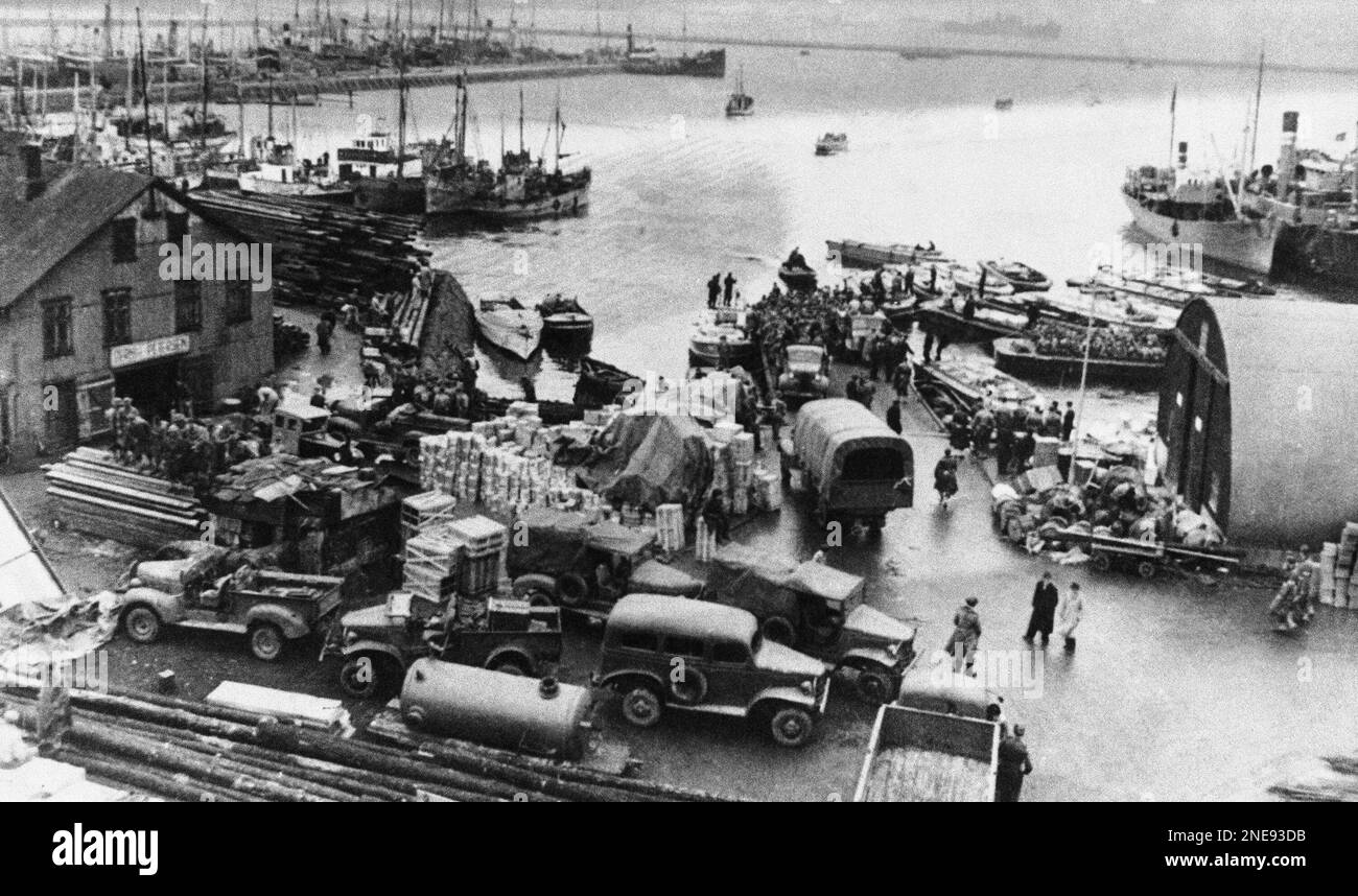 A dock at Reykjavik, Iceland on Nov. 1, 1941, bustles with activity as ...