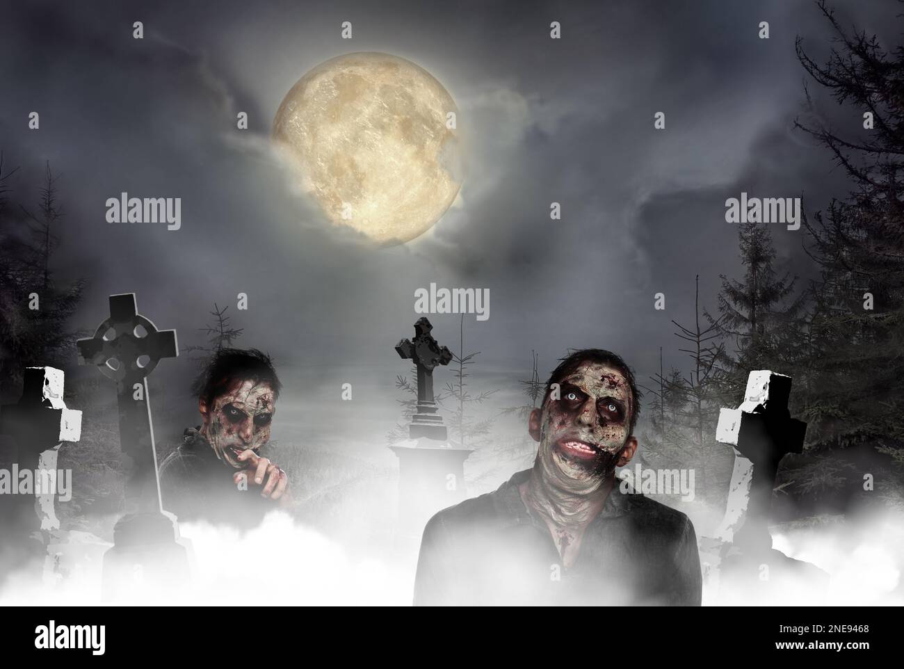 Scary zombies at misty cemetery with old creepy headstones under full ...