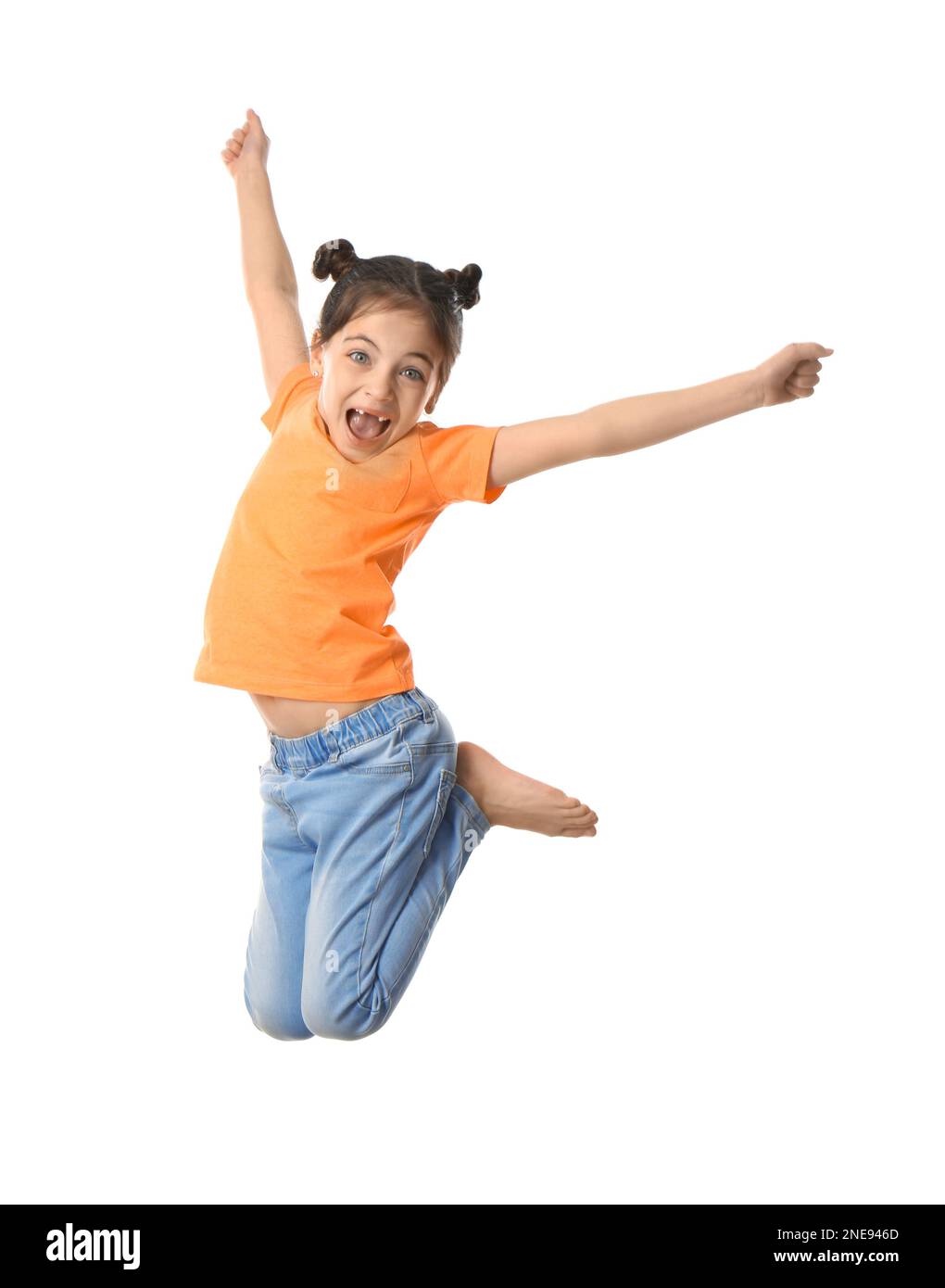 Cute little girl jumping on white background Stock Photo - Alamy