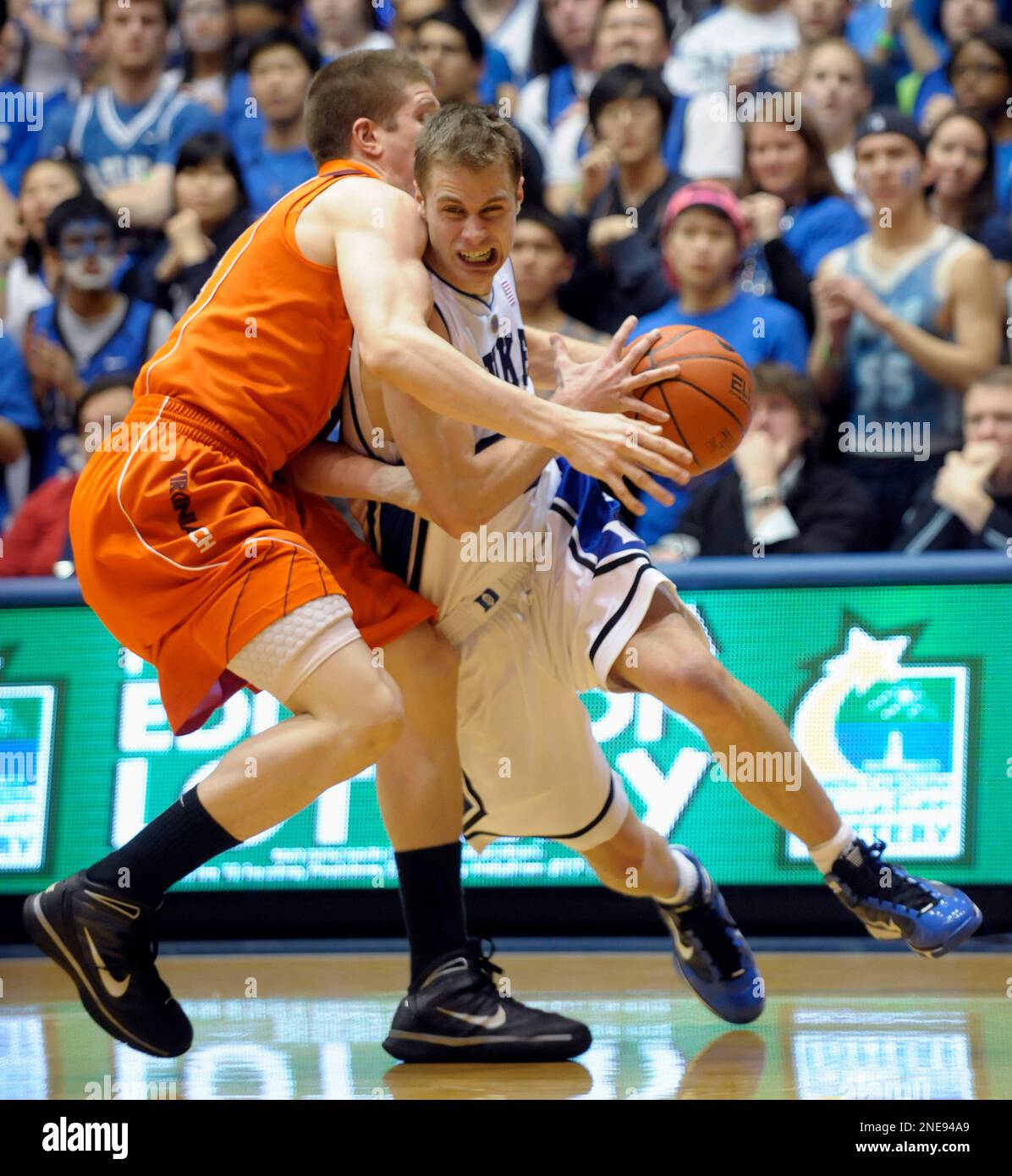 Duke's Jon Scheyer, right, drives into Virginia Tech's Ben Boggs during ...