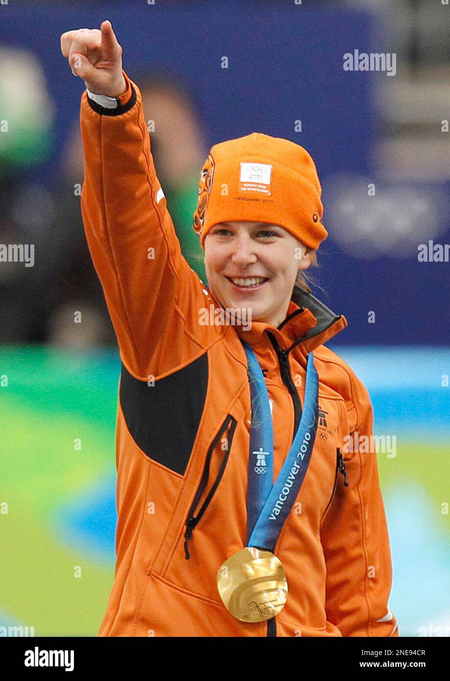 Gold medallist Netherlands's Ireen Wust reacts on the podium after the ...
