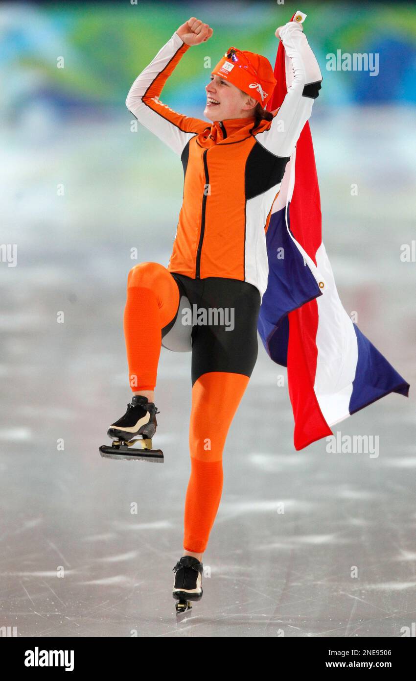 Gold medallist Netherlands's Ireen Wust reacts after the 1500 meters ...