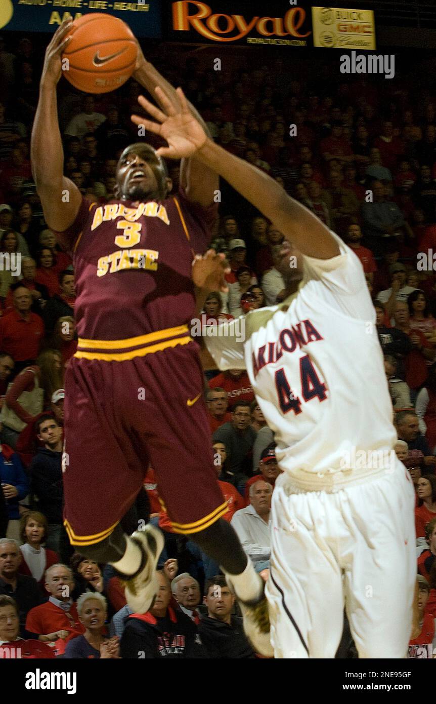 Arizona State's Ty Abbott (3) shoots over around Arizona's Solomon Hill ...