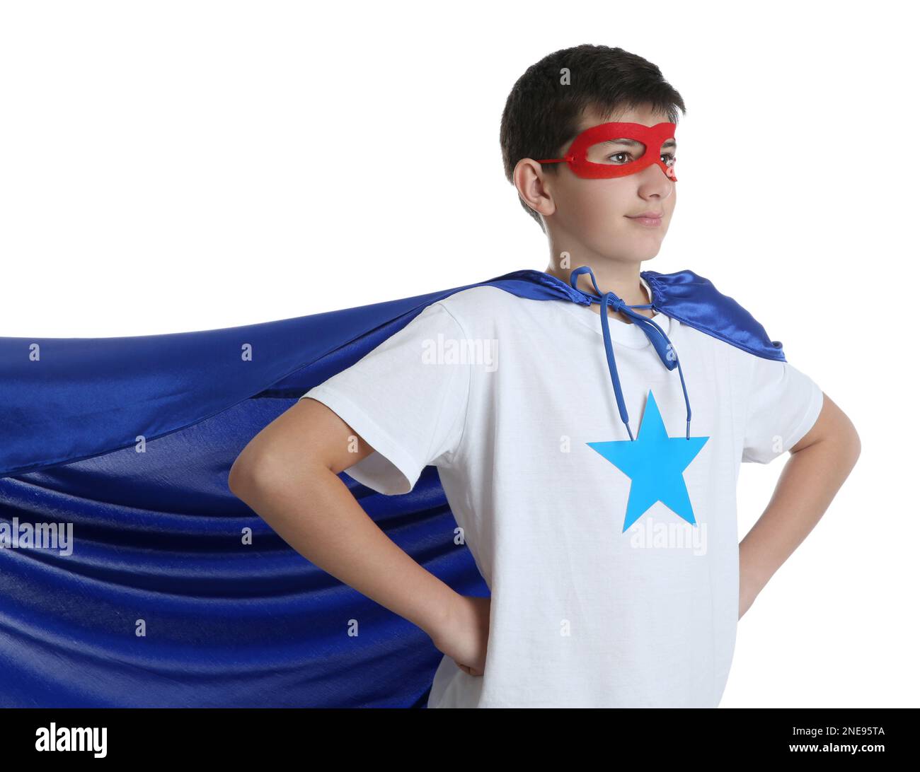 Teenage boy in superhero costume on white background Stock Photo - Alamy