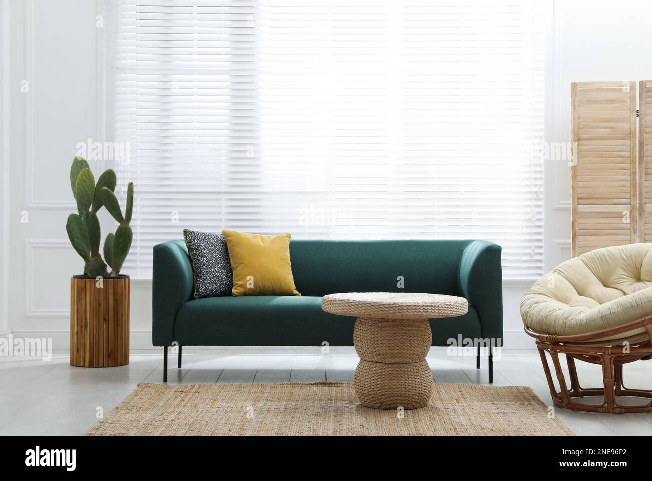 Comfortable sofa in modern living room. Interior design Stock Photo - Alamy
