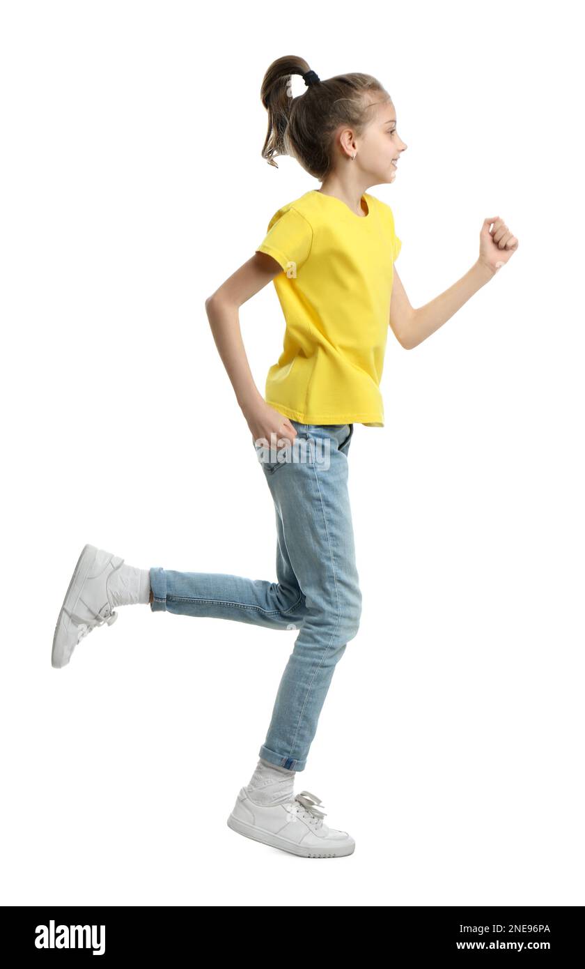 Cute little girl running on white background Stock Photo - Alamy
