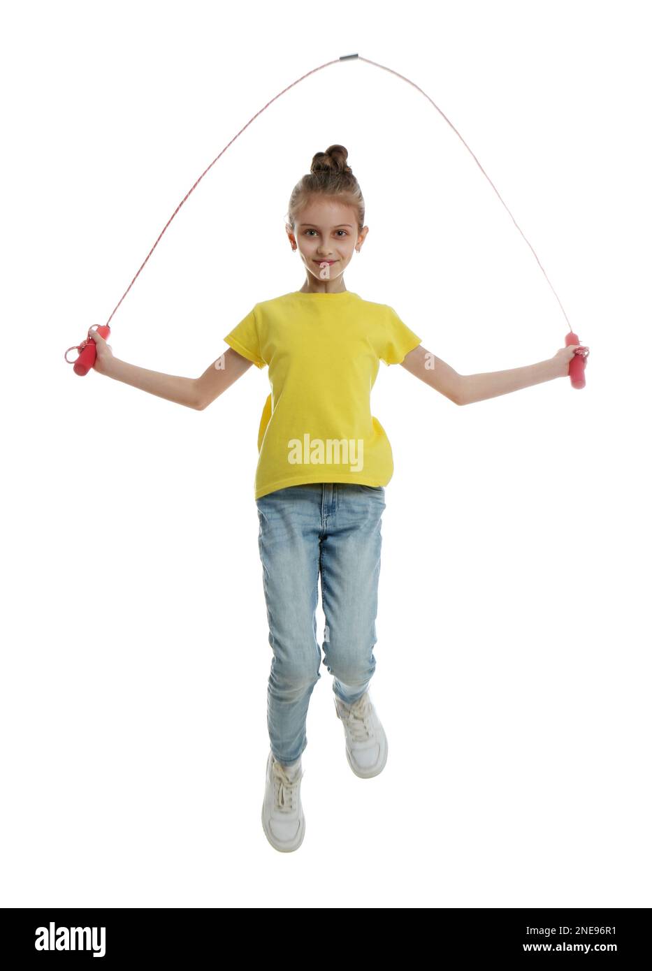 Cute little girl with jump rope on white background Stock Photo - Alamy