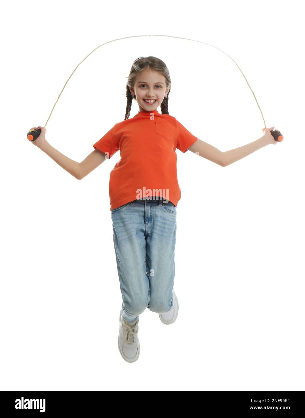 Cute little girl with jump rope on white background Stock Photo - Alamy