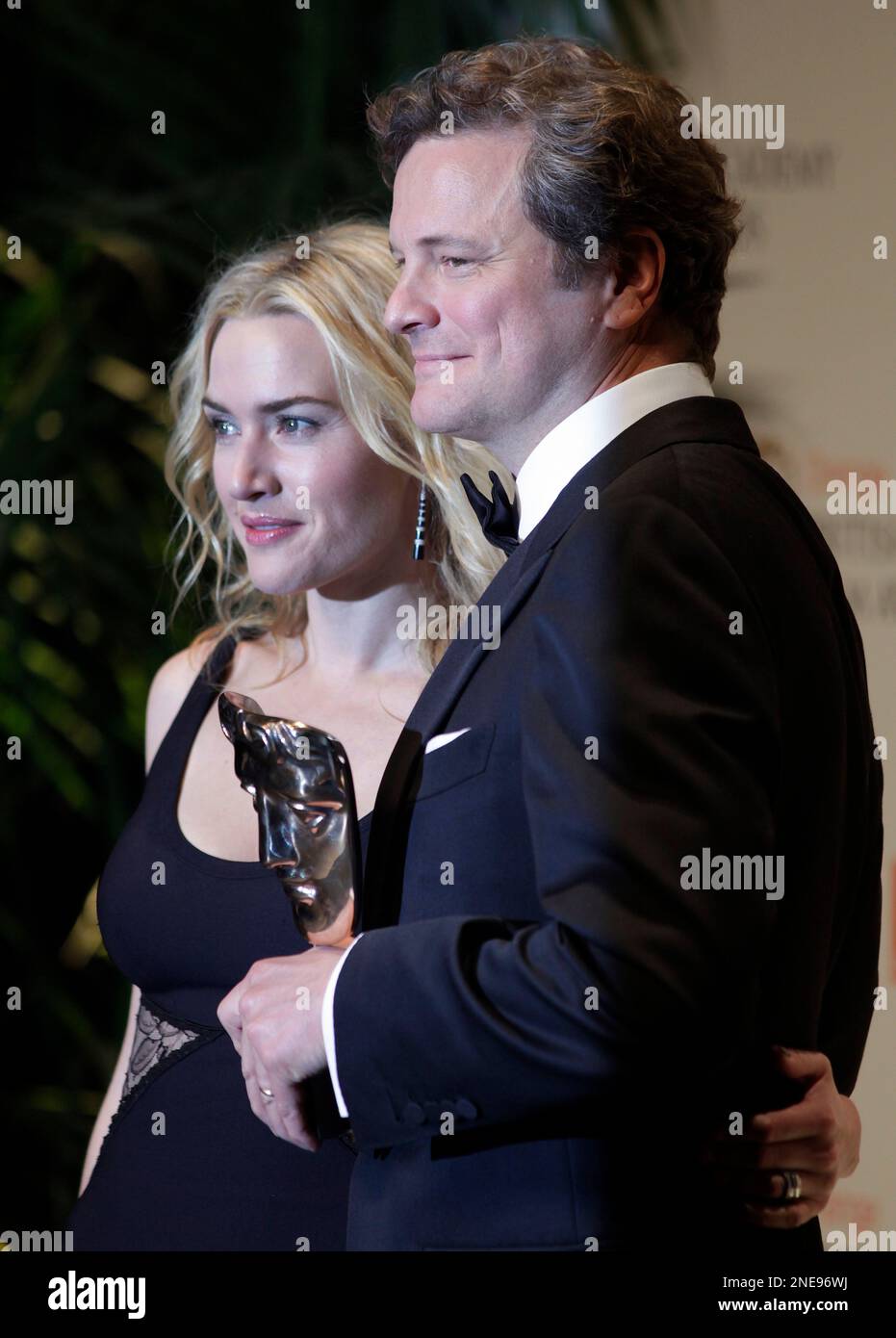 British actor Colin Firth, right, accompanied by actress Kate Winslet ...