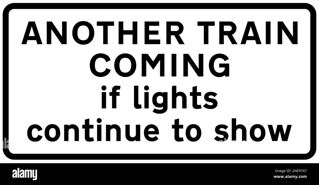 Another train coming if lights continue to show British road sign Stock ...