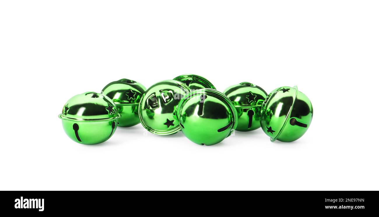 Shiny green sleigh bells on white background Stock Photo - Alamy