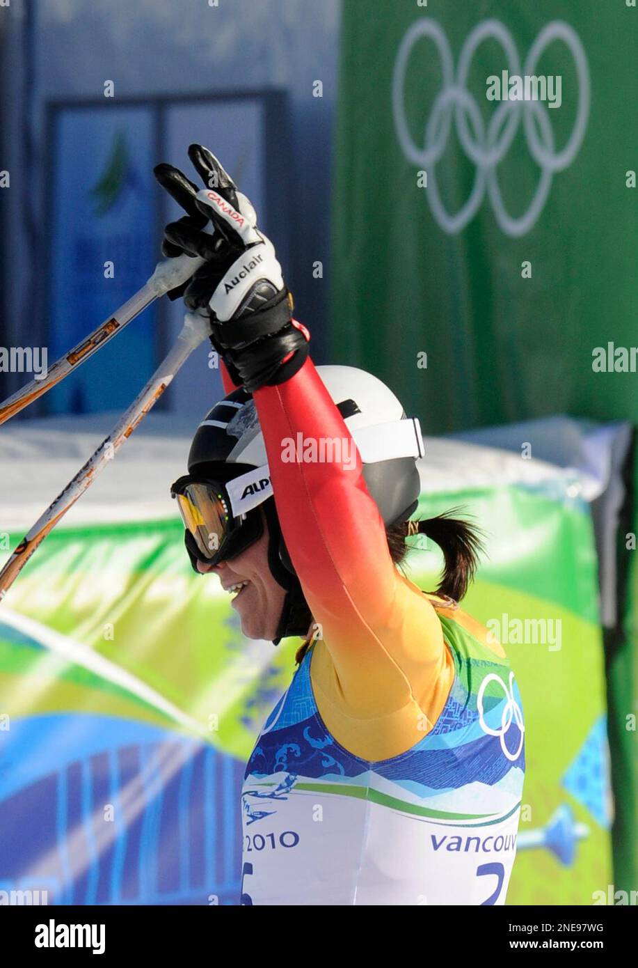 Shona Rubens of Canada waves to the crowd following the downhill ...