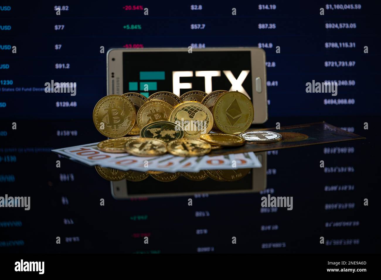 FTX logo with crypto coins with 100 Dollar bill are displayed for ...