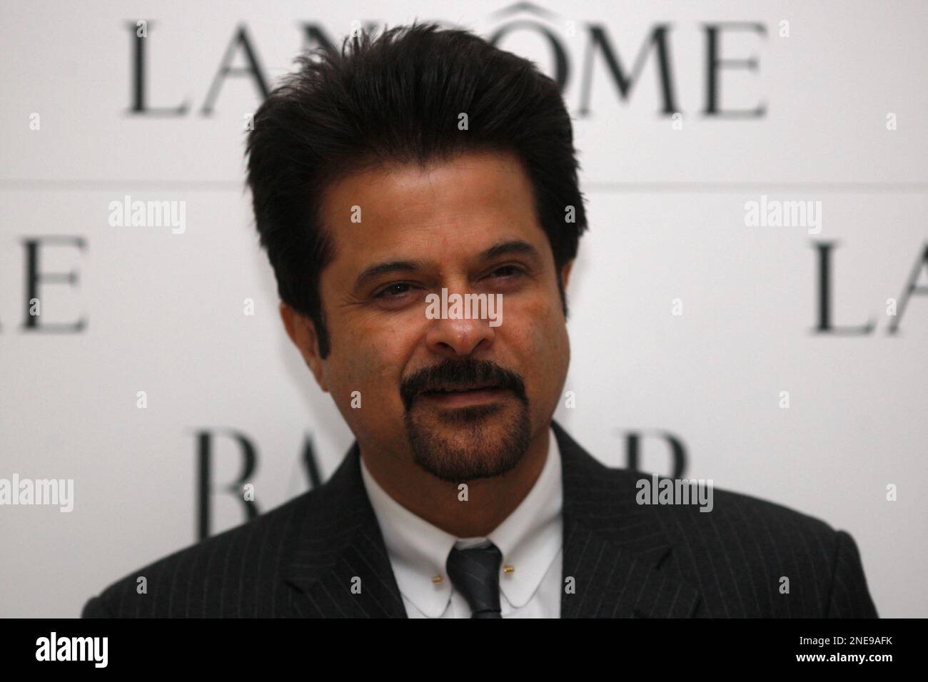 Indian actor Anil Kapoor poses as he arrives for a Lancome pre-BAFTA ...
