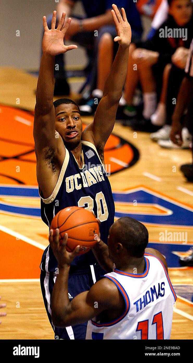 UC Davis' Jelani Floyd (30) reaches over the shot of Boise State's ...
