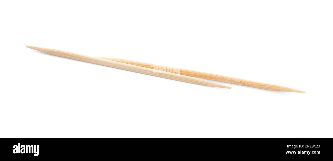 Two disposable wooden toothpicks on white background Stock Photo - Alamy