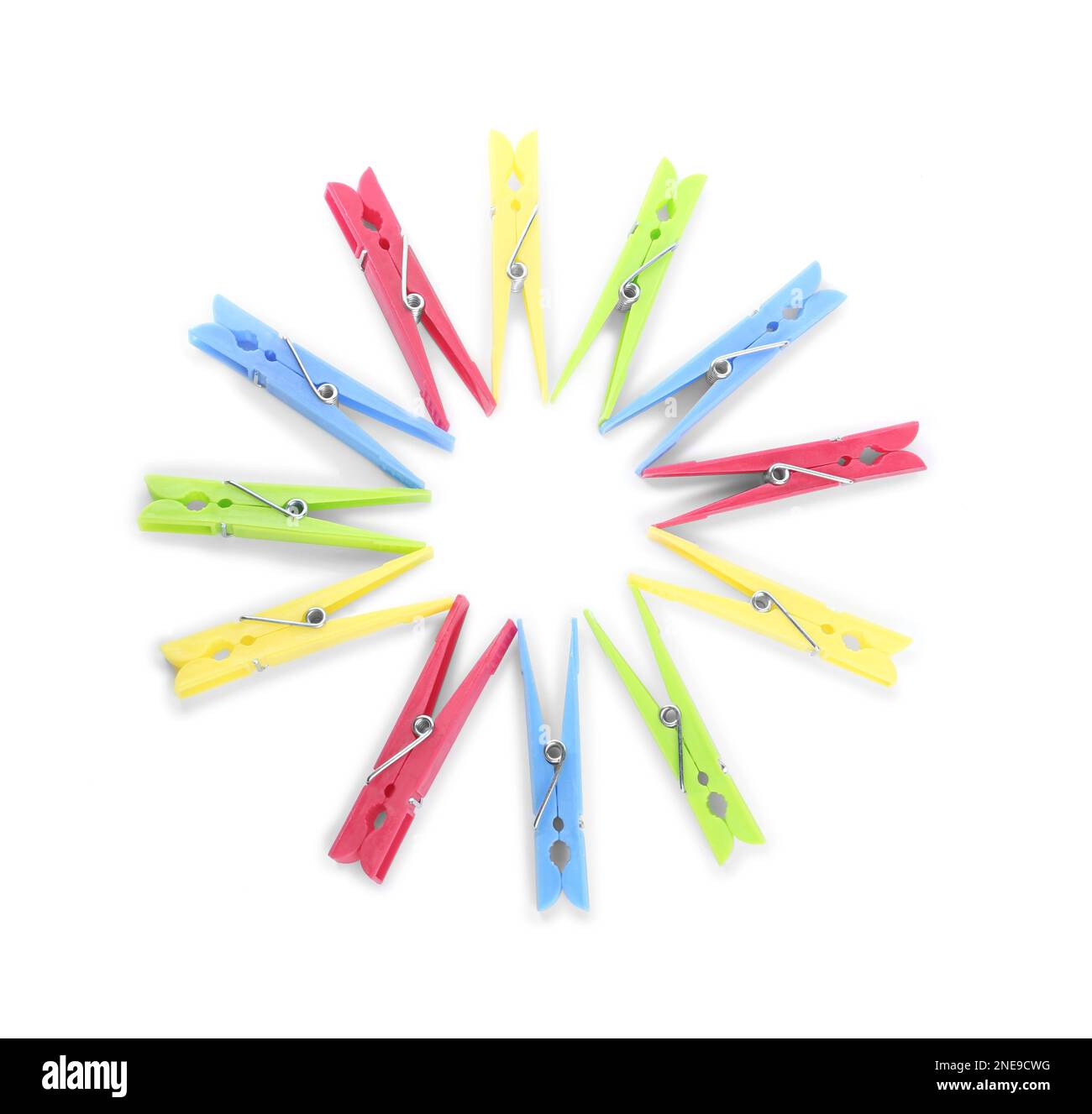Colorful plastic clothespins on white background, above view Stock ...