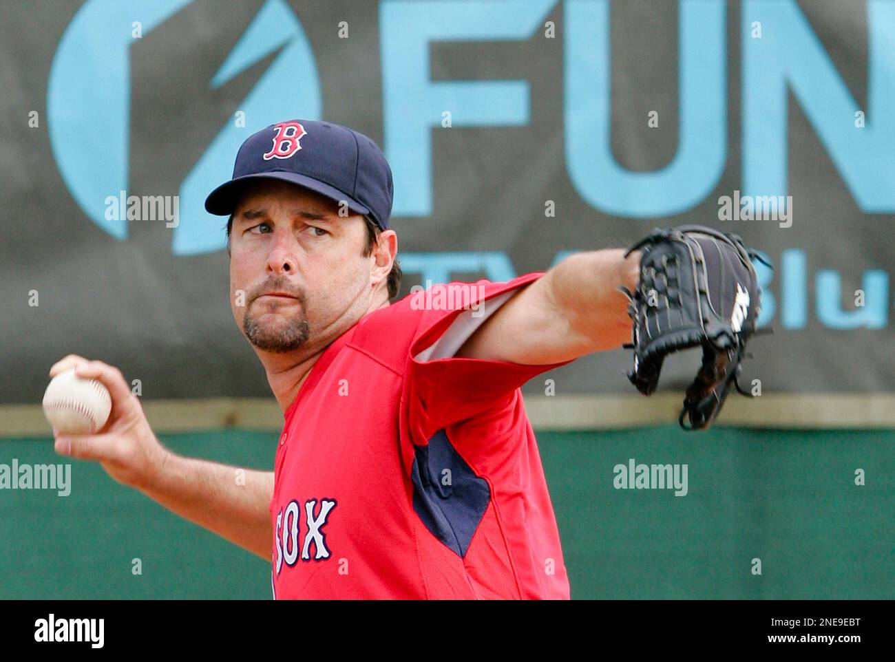 Boston Red Sox pitcher Tim Wakefield throws at baseball spring training ...