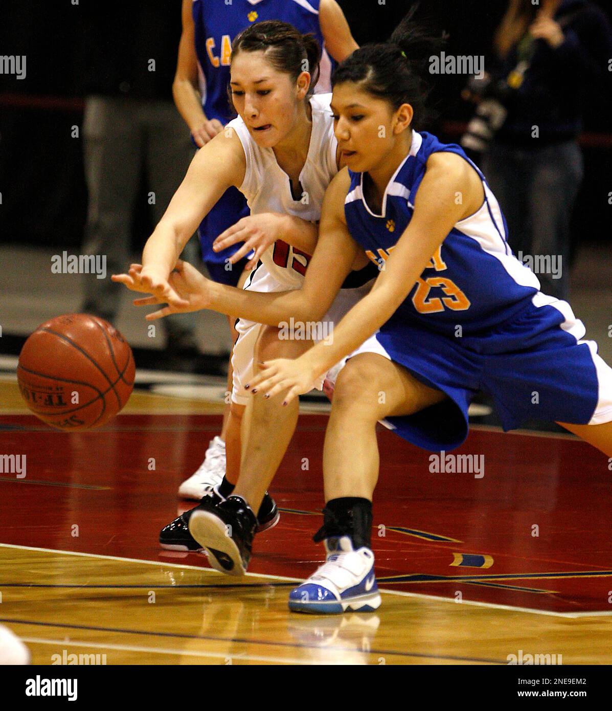 Richfield's Mirian Rivas (15) and Carey's Nicky Gomez (23) go after a ...