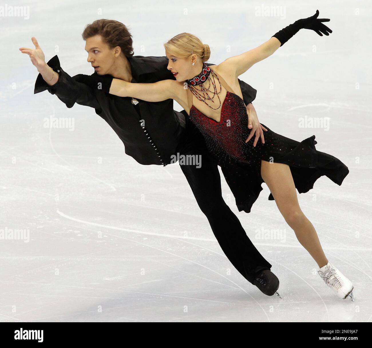 Russia's Ekaterina Bobrova and Dmitri Soloviev perform their compulsory ...