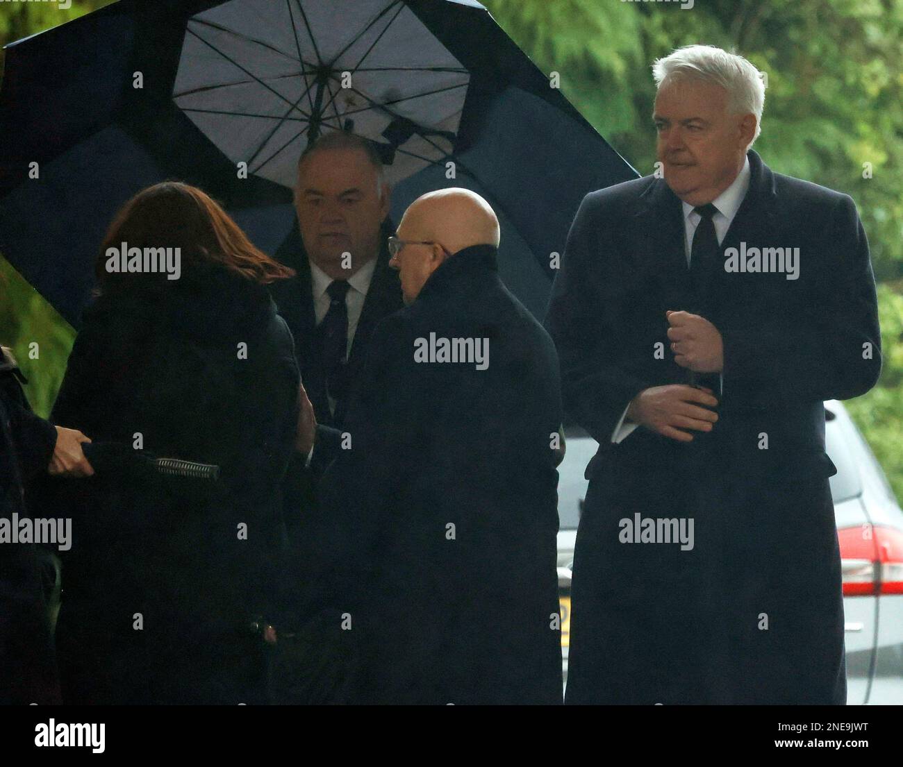Former First Minister Carwyn Jones (right) attending the funeral of ...