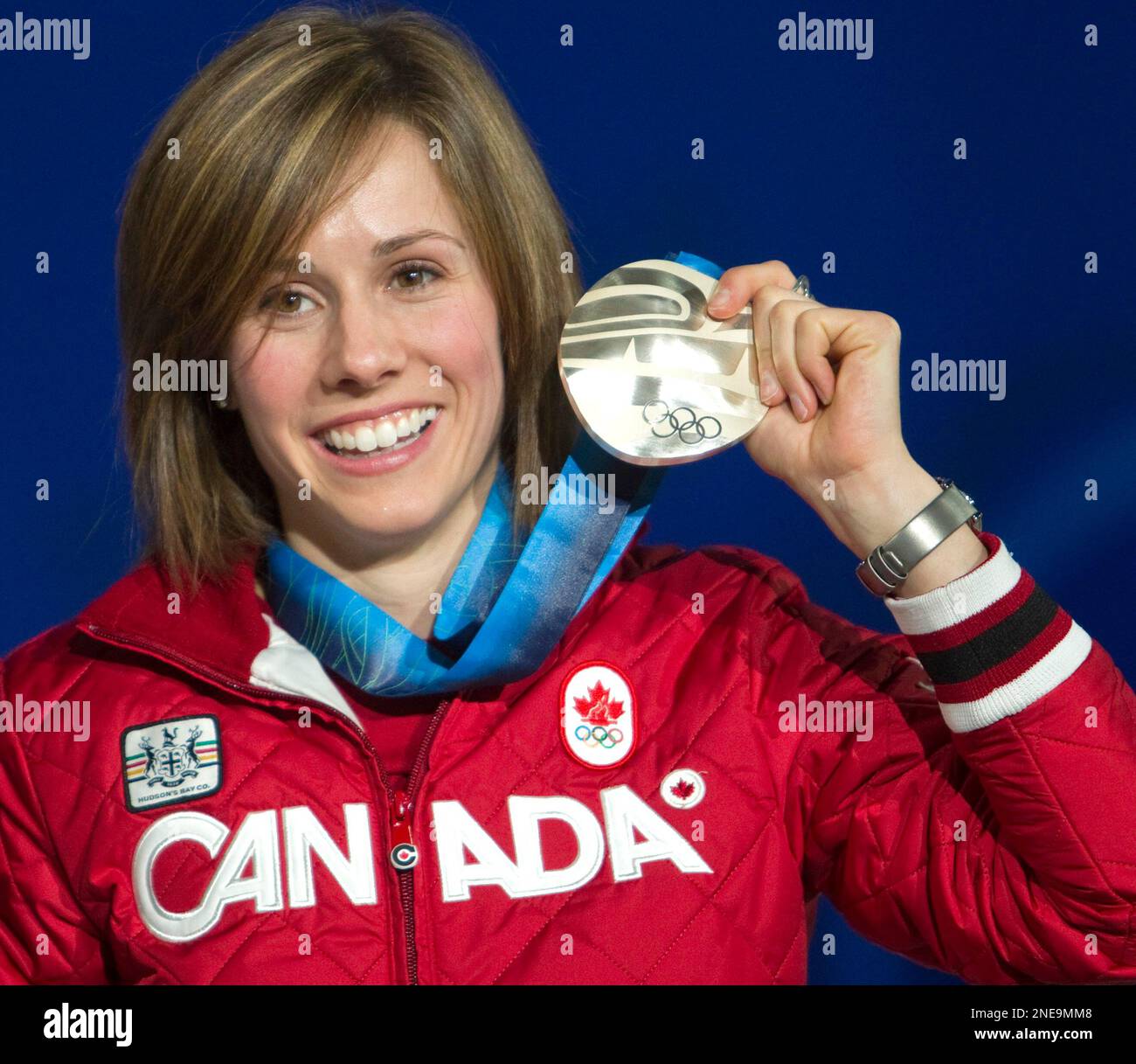 Canada's Jennifer Heil celebrates her silver medal for ladies moguls in ...
