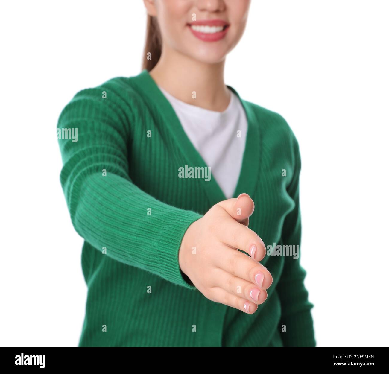 Happy young woman offering handshake on white background, closeup Stock ...