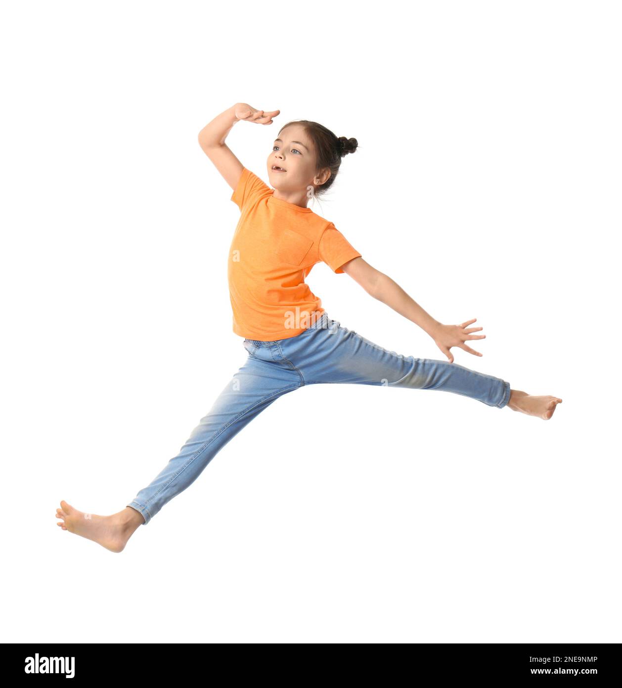 Cute little girl jumping on white background Stock Photo - Alamy