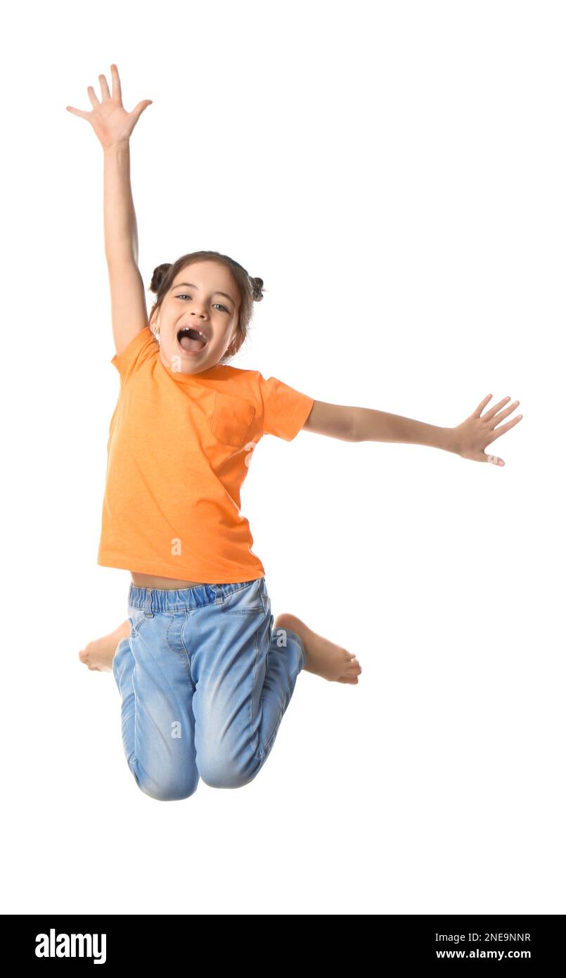 Cute little girl jumping on white background Stock Photo - Alamy