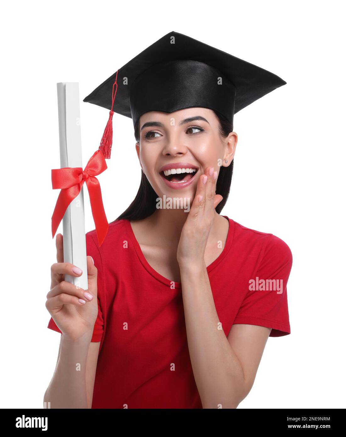 Emotional student with graduation hat and diploma on white background ...