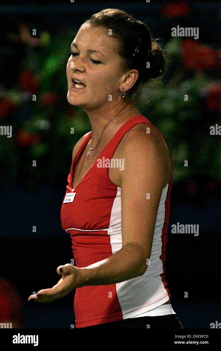 Poland's Agnieszka Radwanska reacts after she lost apoint to Victoria ...