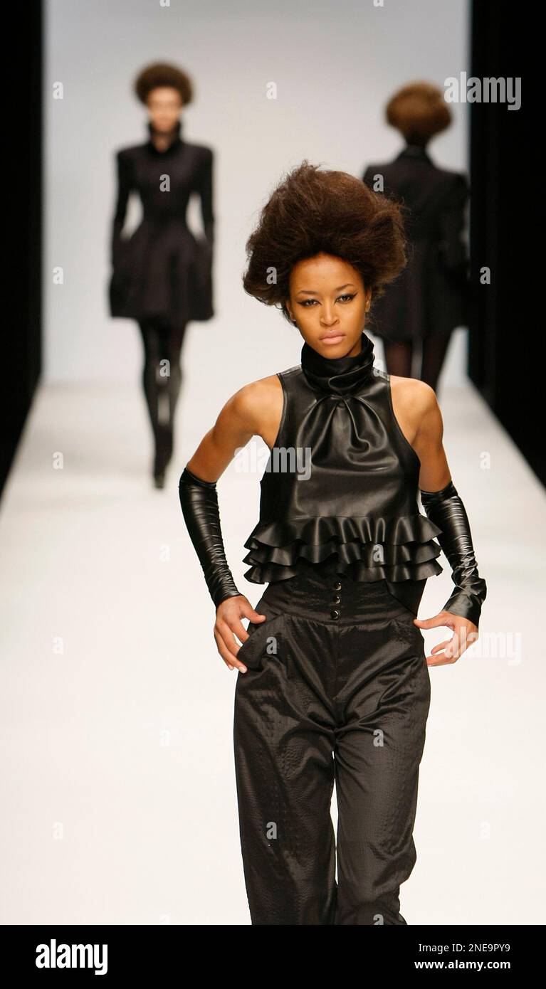 A model wears an outfit by designer Paul Costelloe for his Autumn ...
