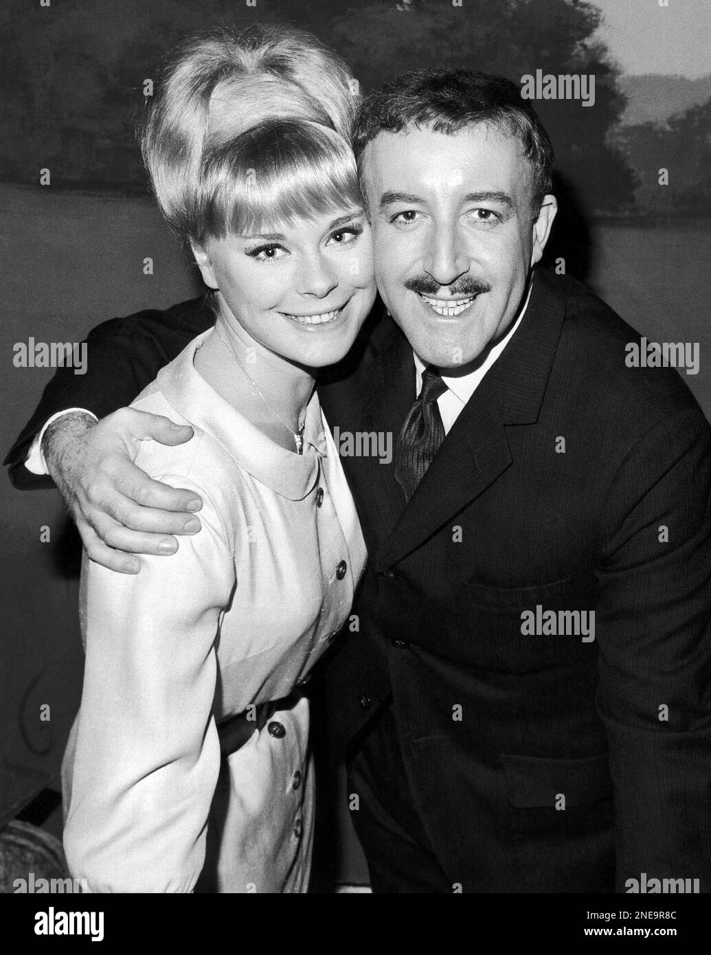 Lovely German actress Elke Sommer gets into a cozy pose with Britain's ...