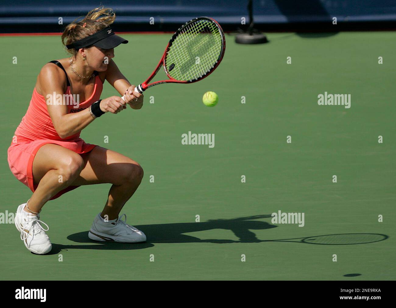 Israel's Shahar Peer returns the ball to Venus Williams of U.S. during ...
