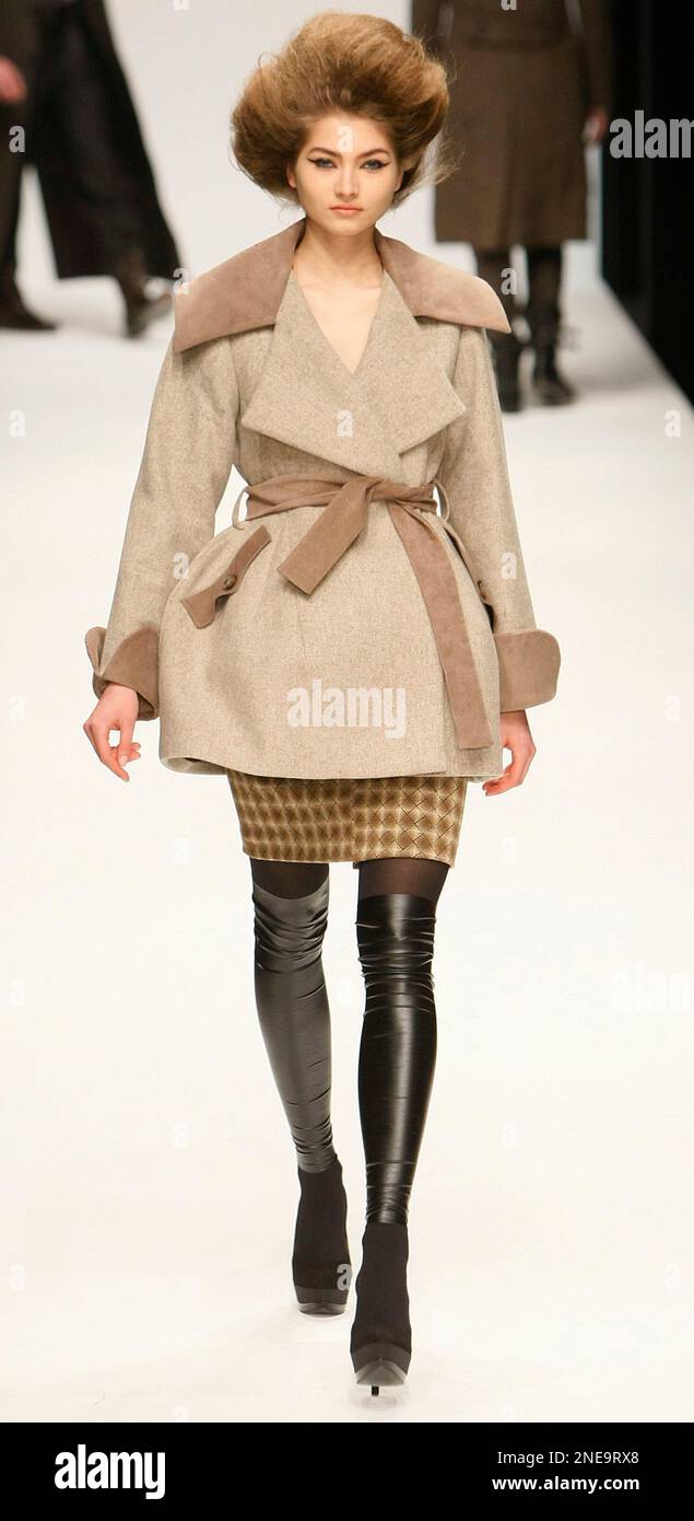 A model wears an outfit by designer Paul Costelloe for his Autumn ...