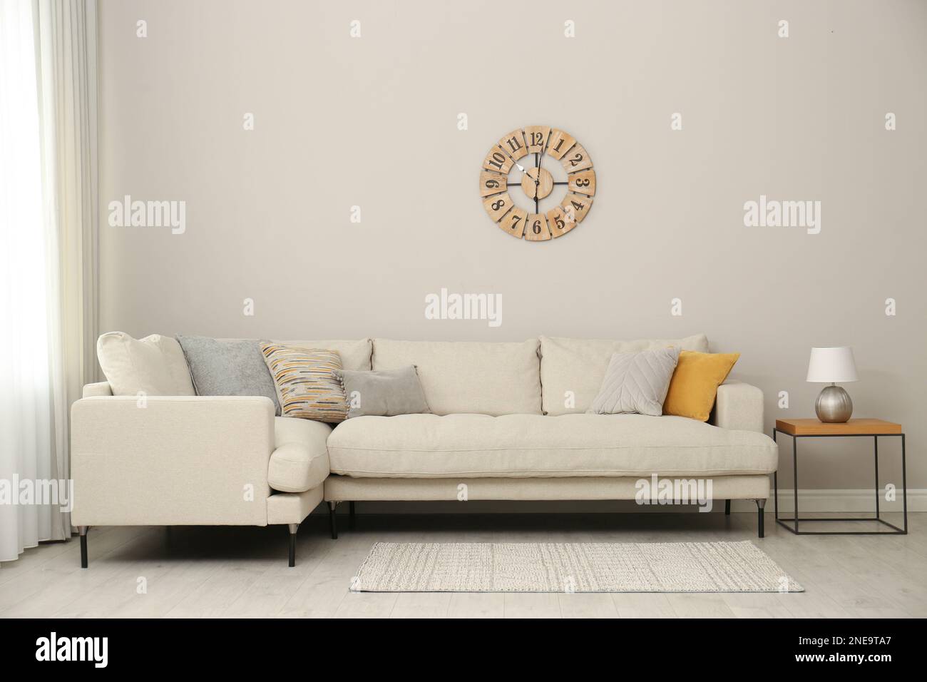 Stylish living room interior with modern comfortable sofa Stock Photo ...