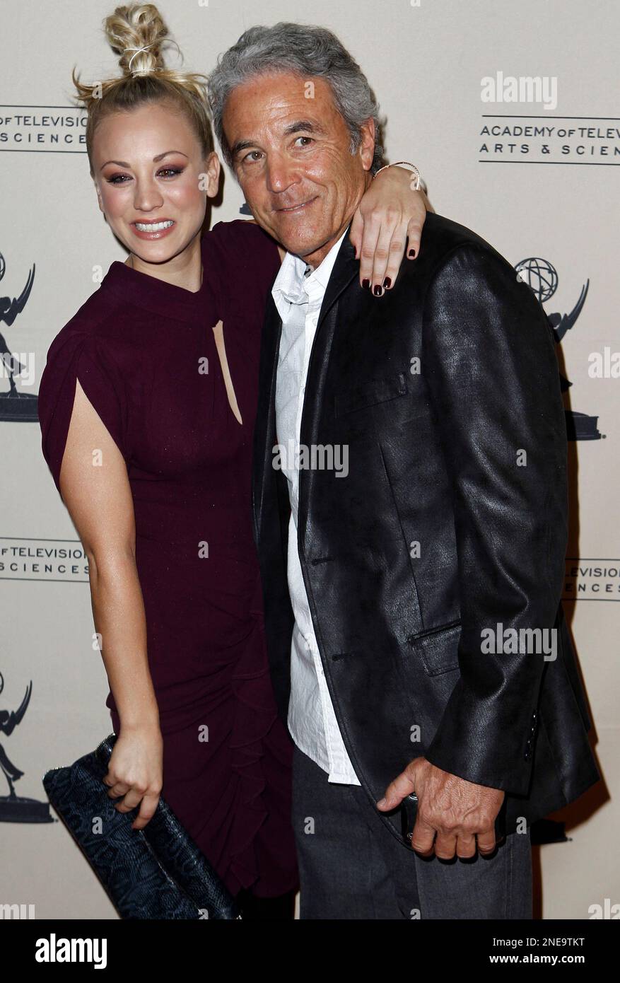 Cast member Kaley Cuoco, left, and her father, Gary, arrive at An ...