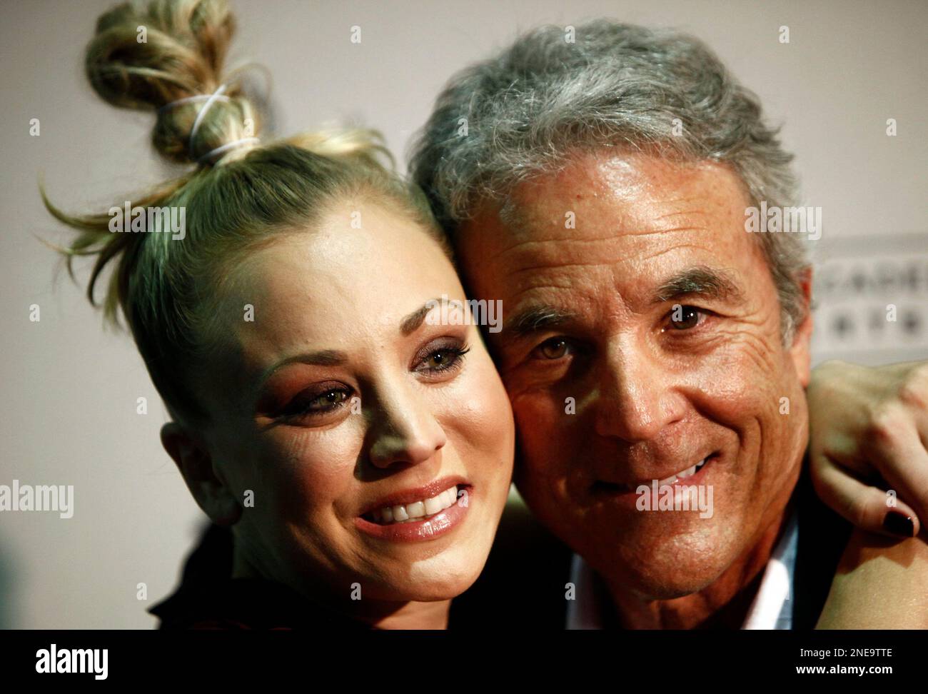 Cast member Kaley Cuoco, left, and her father, Gary, arrive at An ...