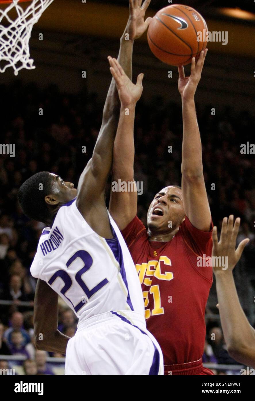 Southern California's Dwight Lewis shoots with Washington's Justin ...