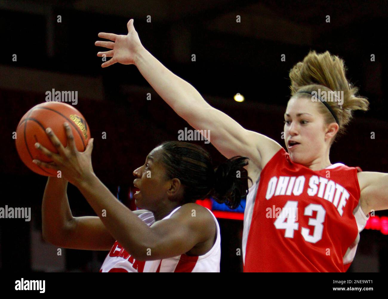 Wisconsin's Anya Covignton, left, shoots against Ohio State's Sarah ...