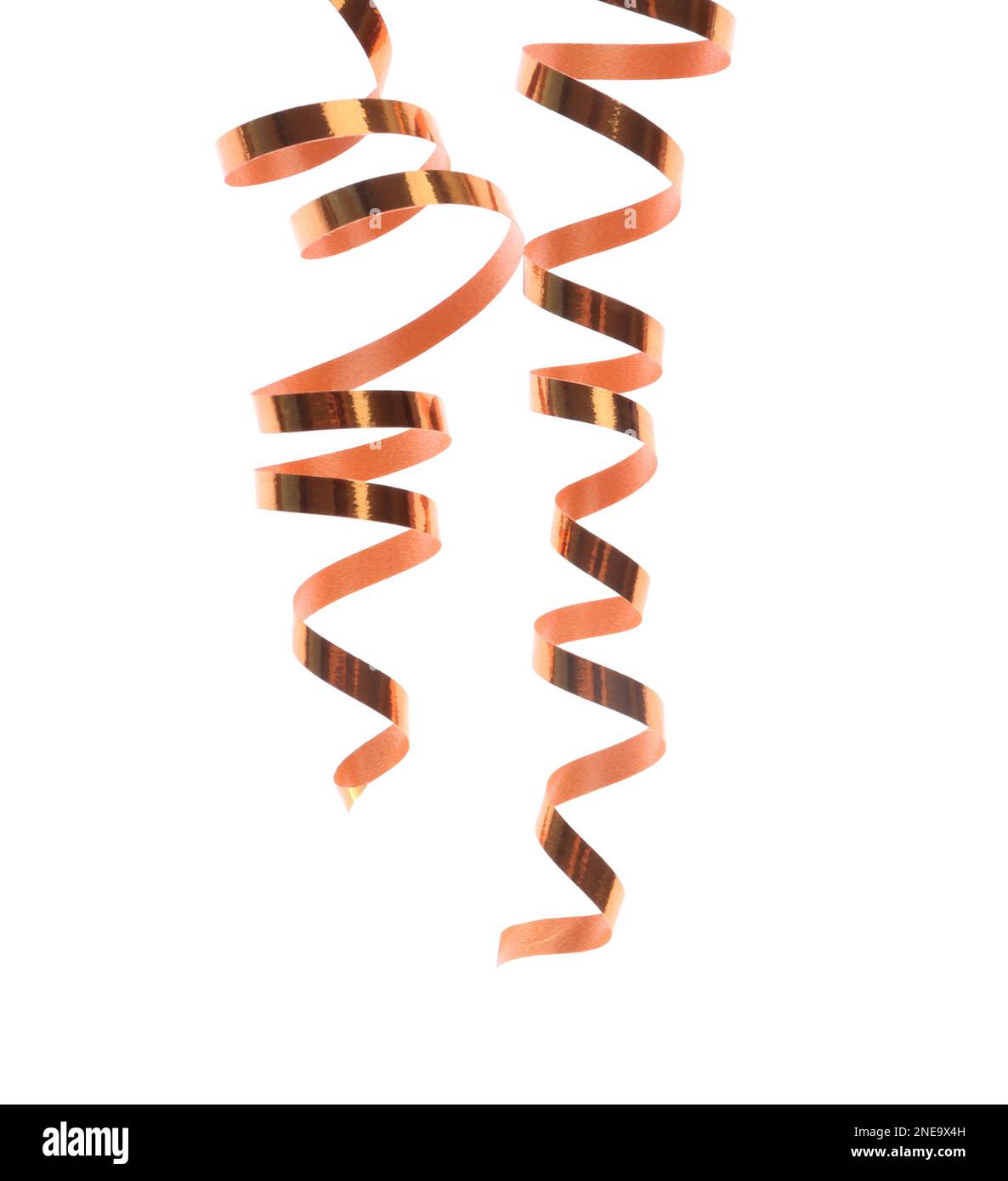Shiny serpentine streamers on white background. Festive decor Stock ...