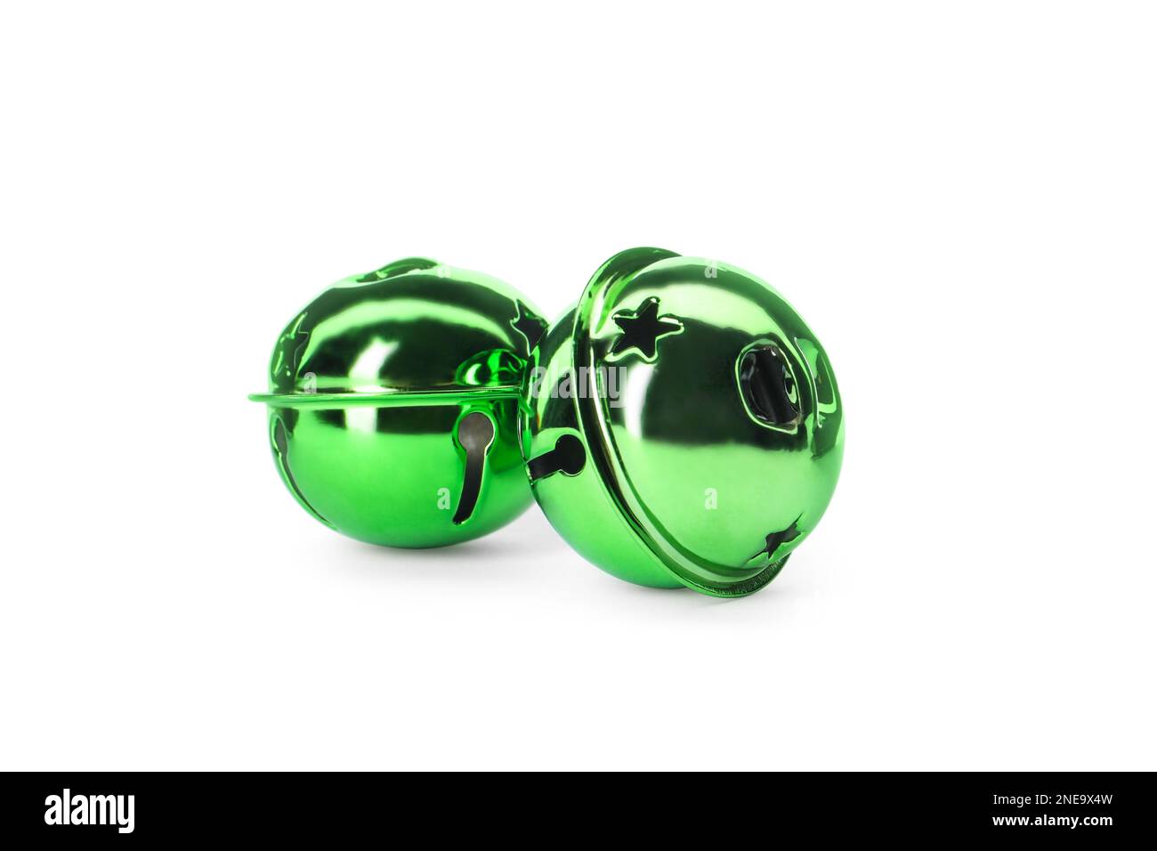 Shiny green sleigh bells on white background Stock Photo - Alamy
