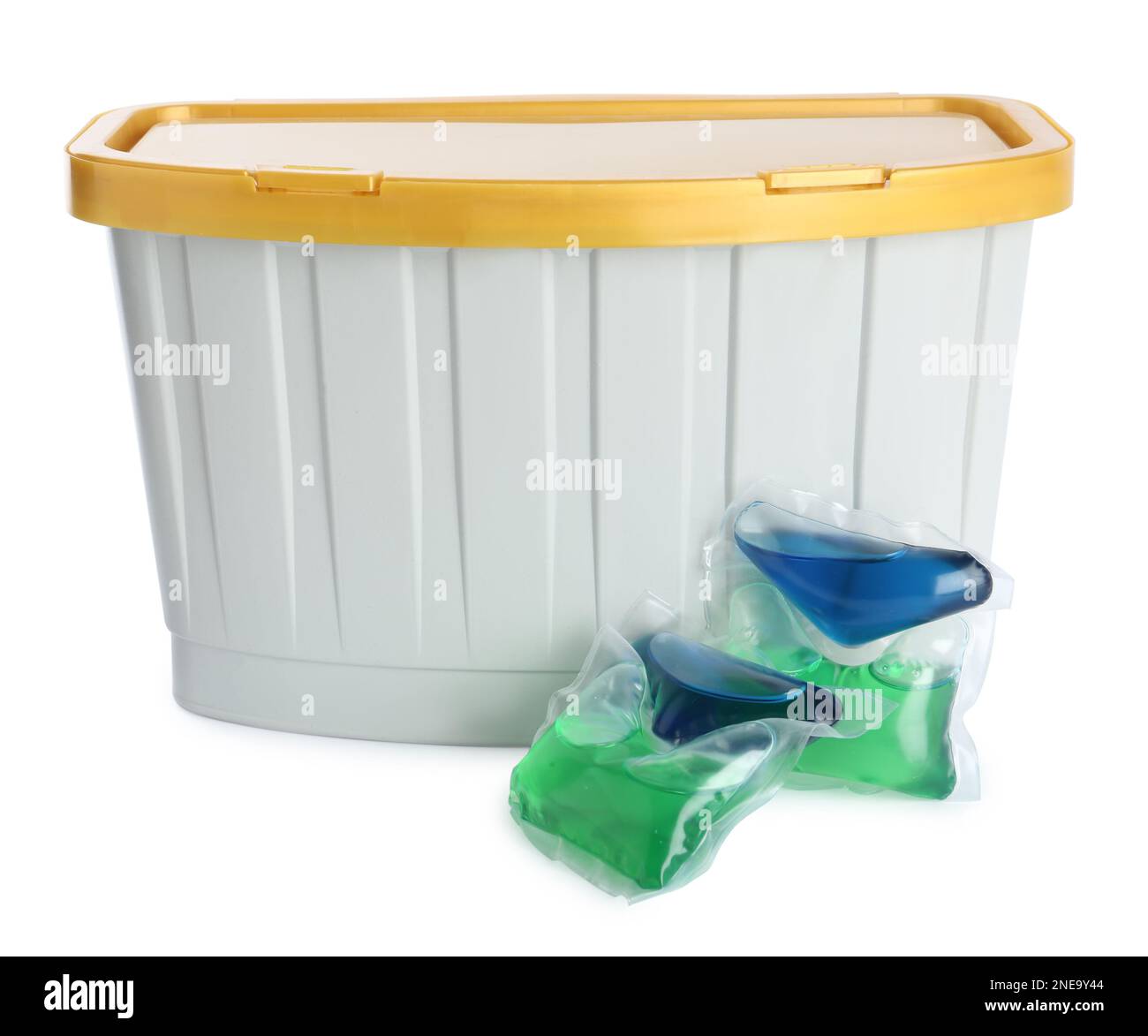 Laundry capsules and box on white background Stock Photo - Alamy