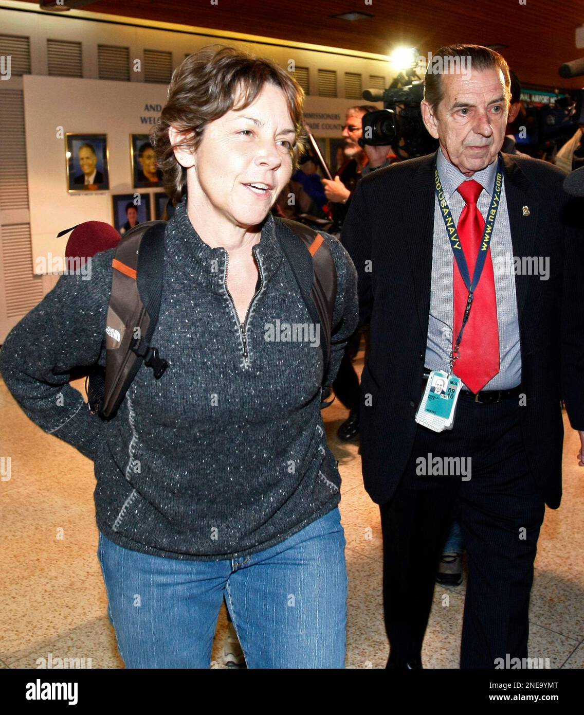 Carla Thompson, 53, of Meridian, Idaho, left, leaves the Miami ...