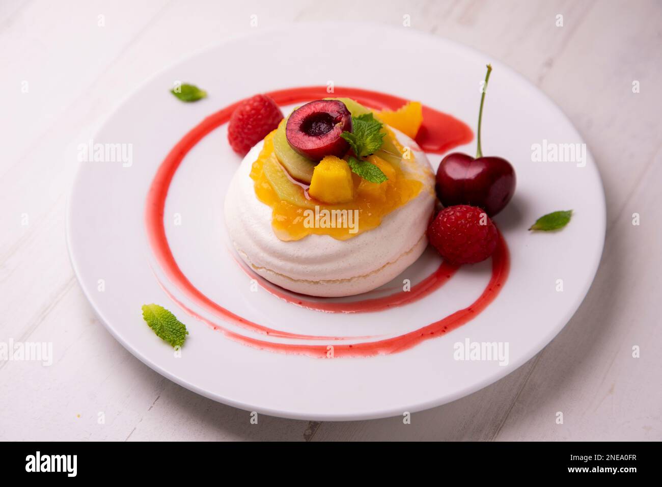 Baked meringue pie filled with fresh fruit Stock Photo - Alamy