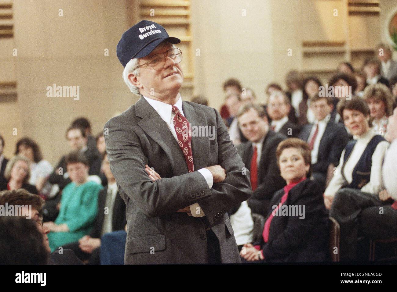 Television talk show host Phil Donahue talking to former employees of ...