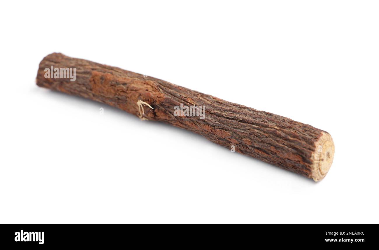 Dried stick of liquorice root isolated on white Stock Photo - Alamy